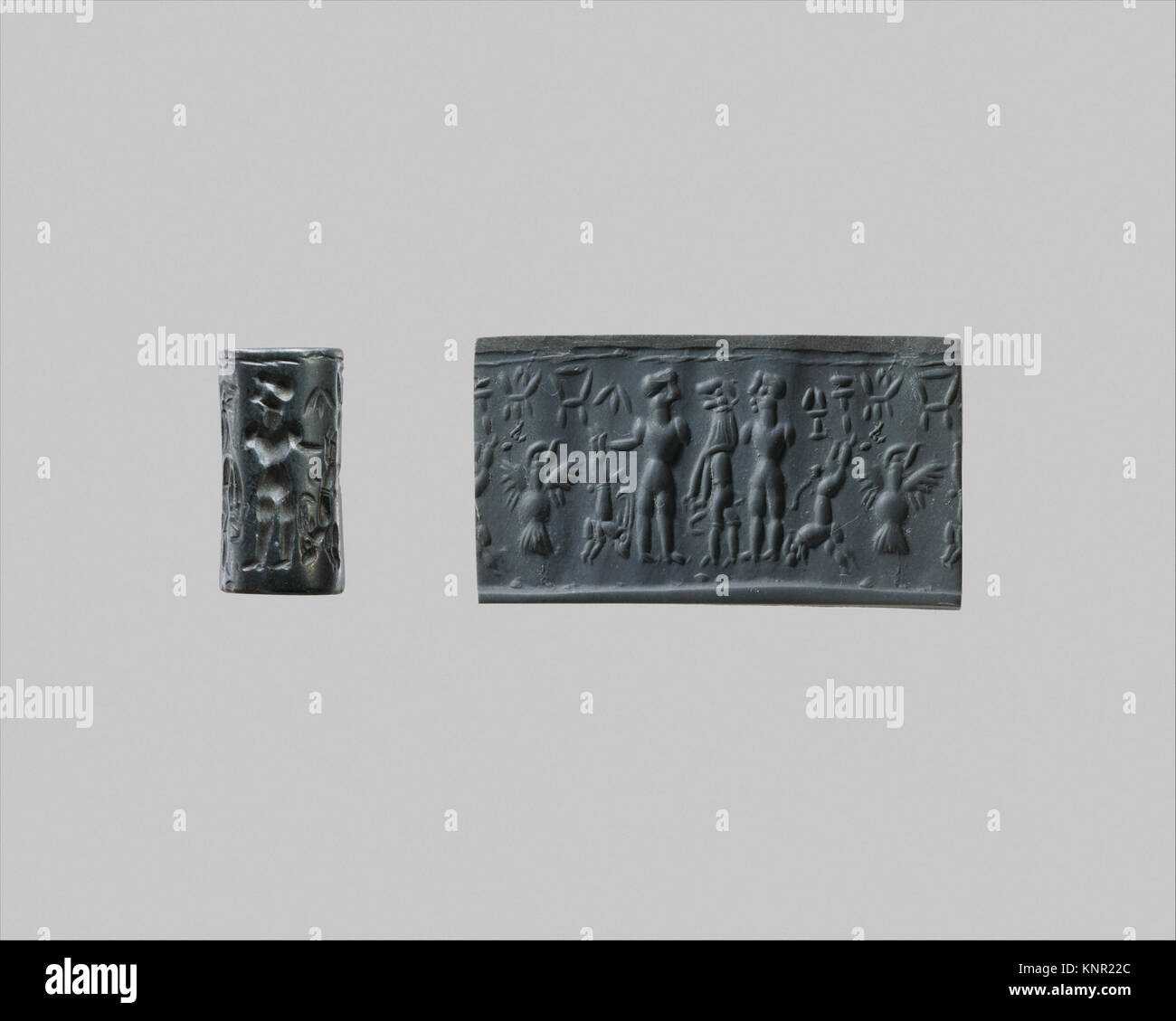 This cylinder seal features a Master of Animals motif, depicting a ...