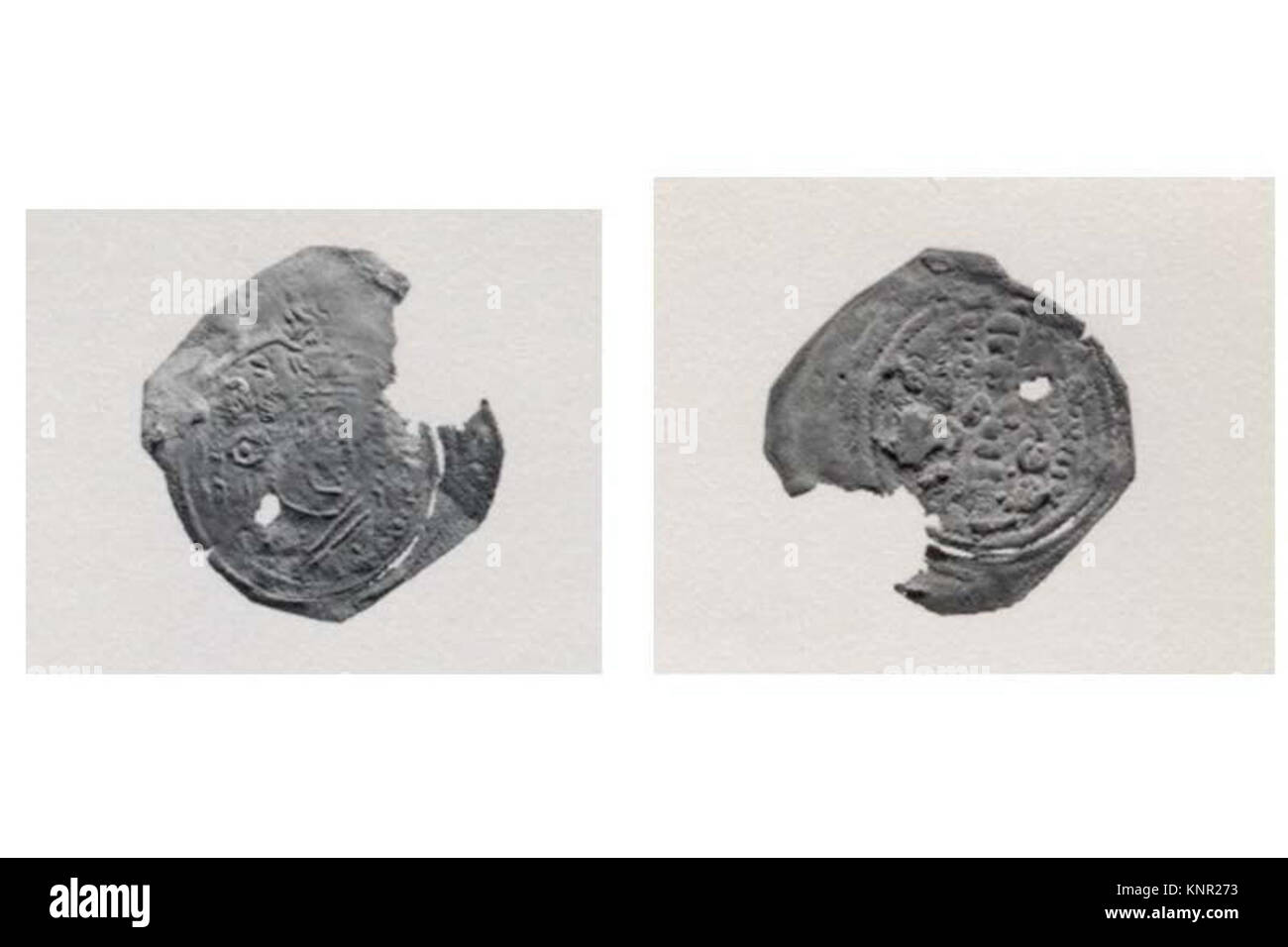 Ancient metal coin displaying imagery and inscriptions, indicative of ...