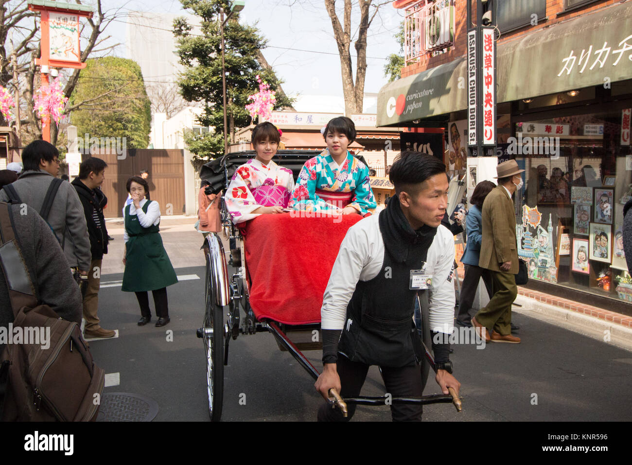 Girls in kimonos riding rickshaw hi-res stock photography and images ...