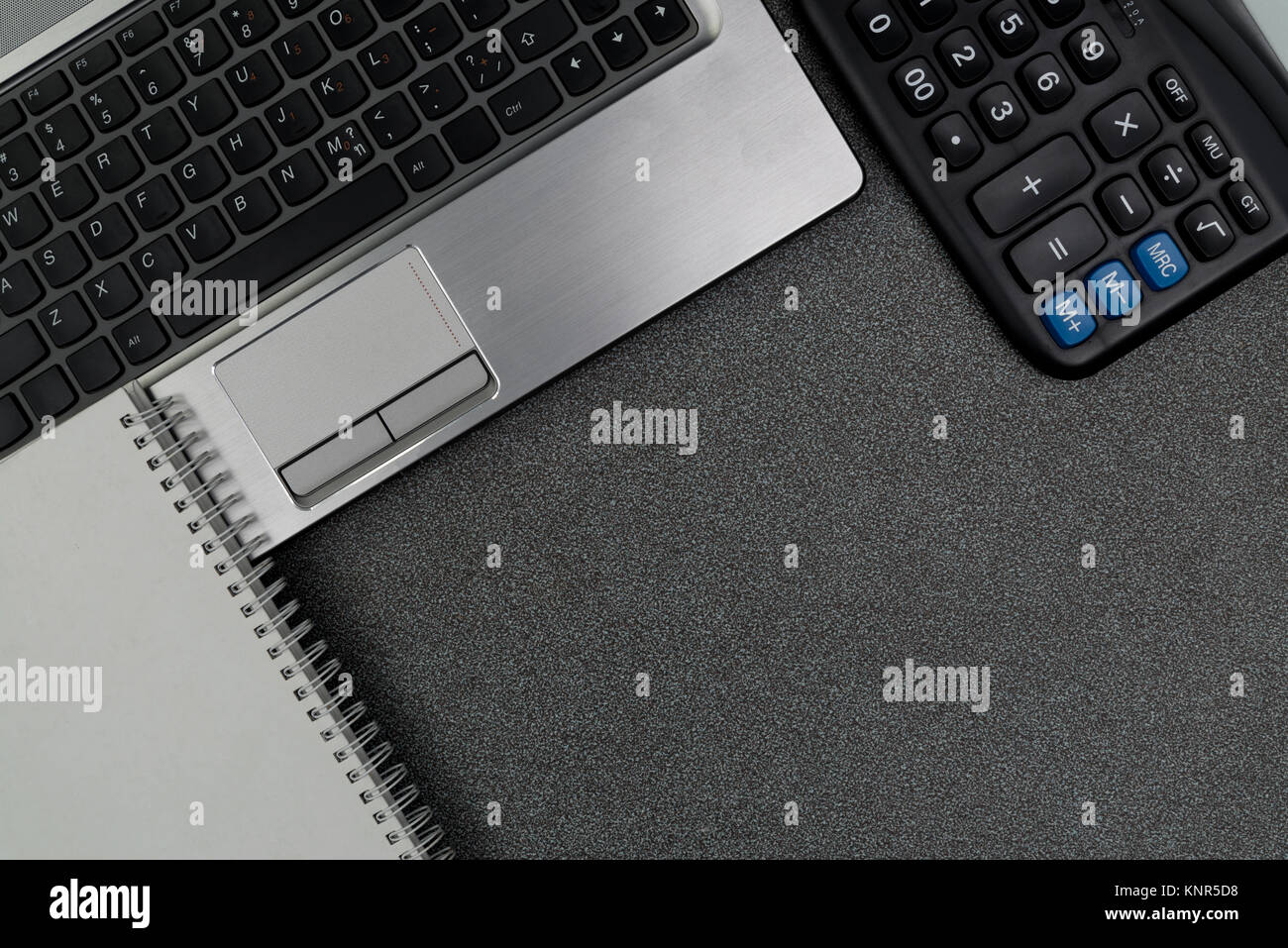 Laptop computer or notebook and other device, calculator and note on ...