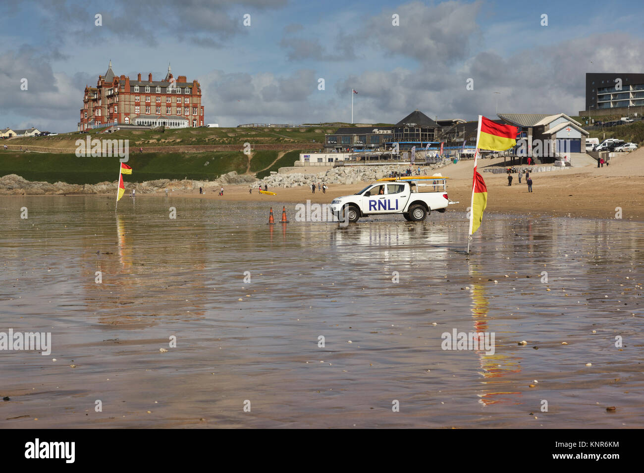 RNLI lifeguards truck and safety flags on Fistral beach in Newquay in ...