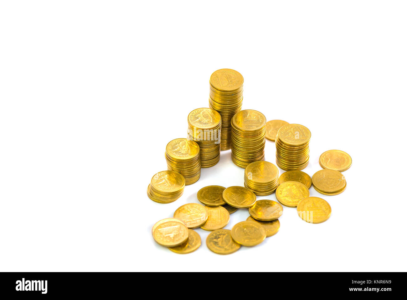Columns of gold coins, piles of coins arranged on white background ...