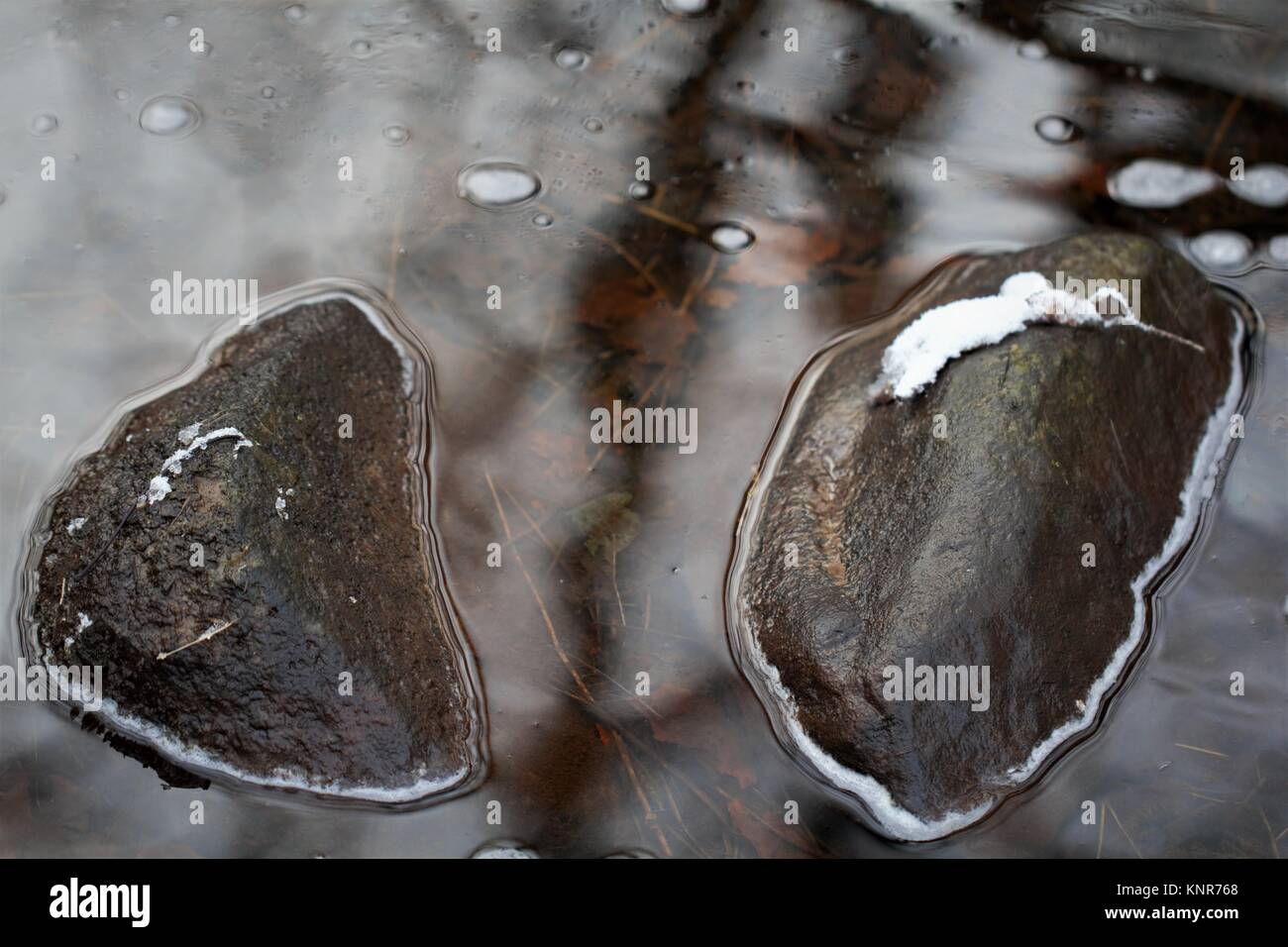 Partially submerged rocks hi-res stock photography and images - Alamy