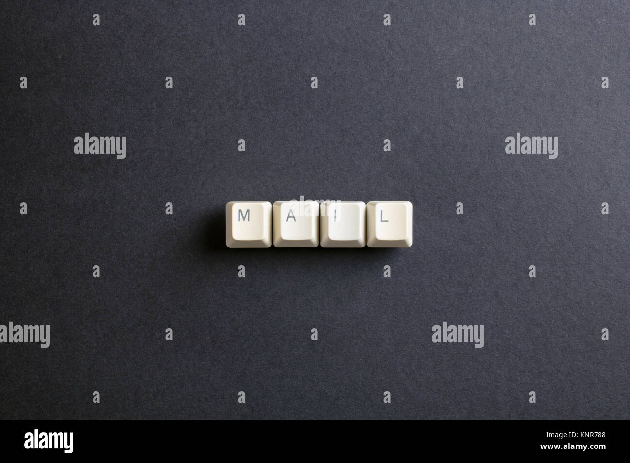 Mail word is written with computer keys button. Flat lay view from ...