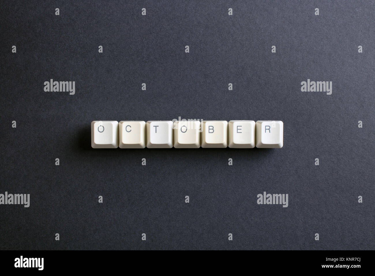 October month word is written with computer keys button. Flat lay view ...