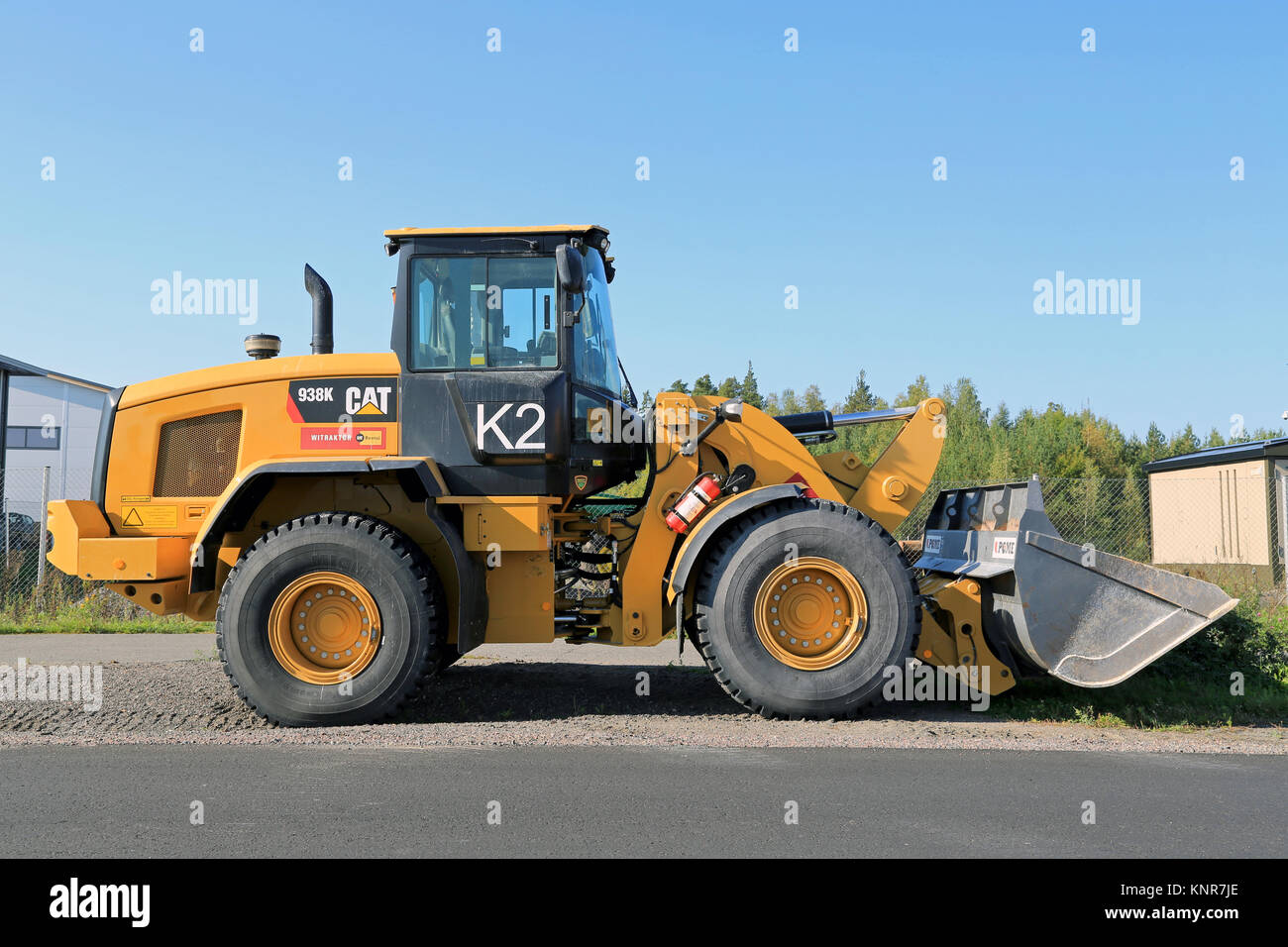 LIETO, FINLAND - SEPTEMBER 13, 2014: CAT 938K Wheel loader. The 938K is ...