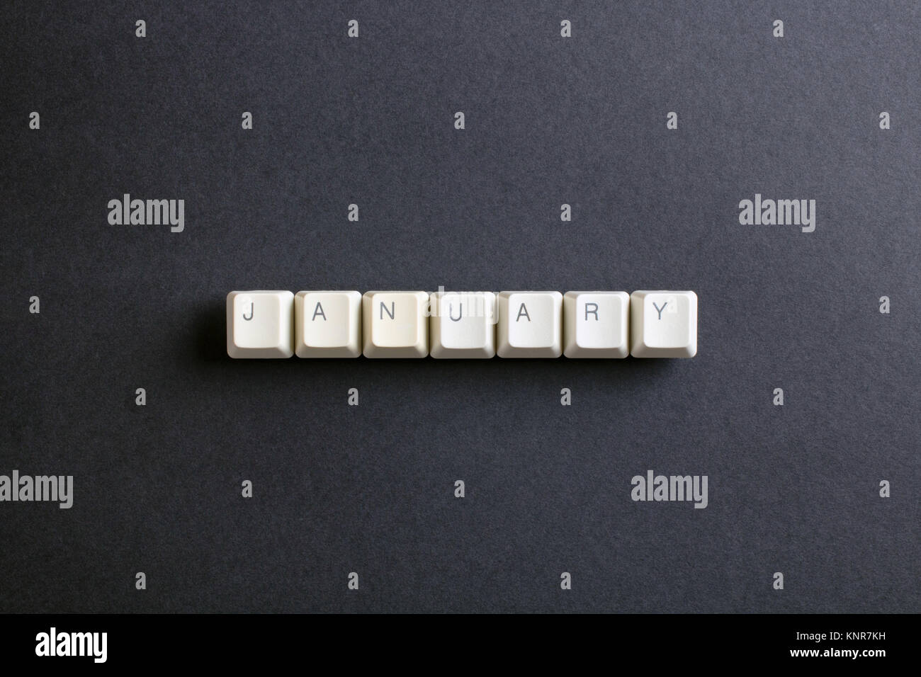 January month word is written with computer keys button. Flat lay view ...