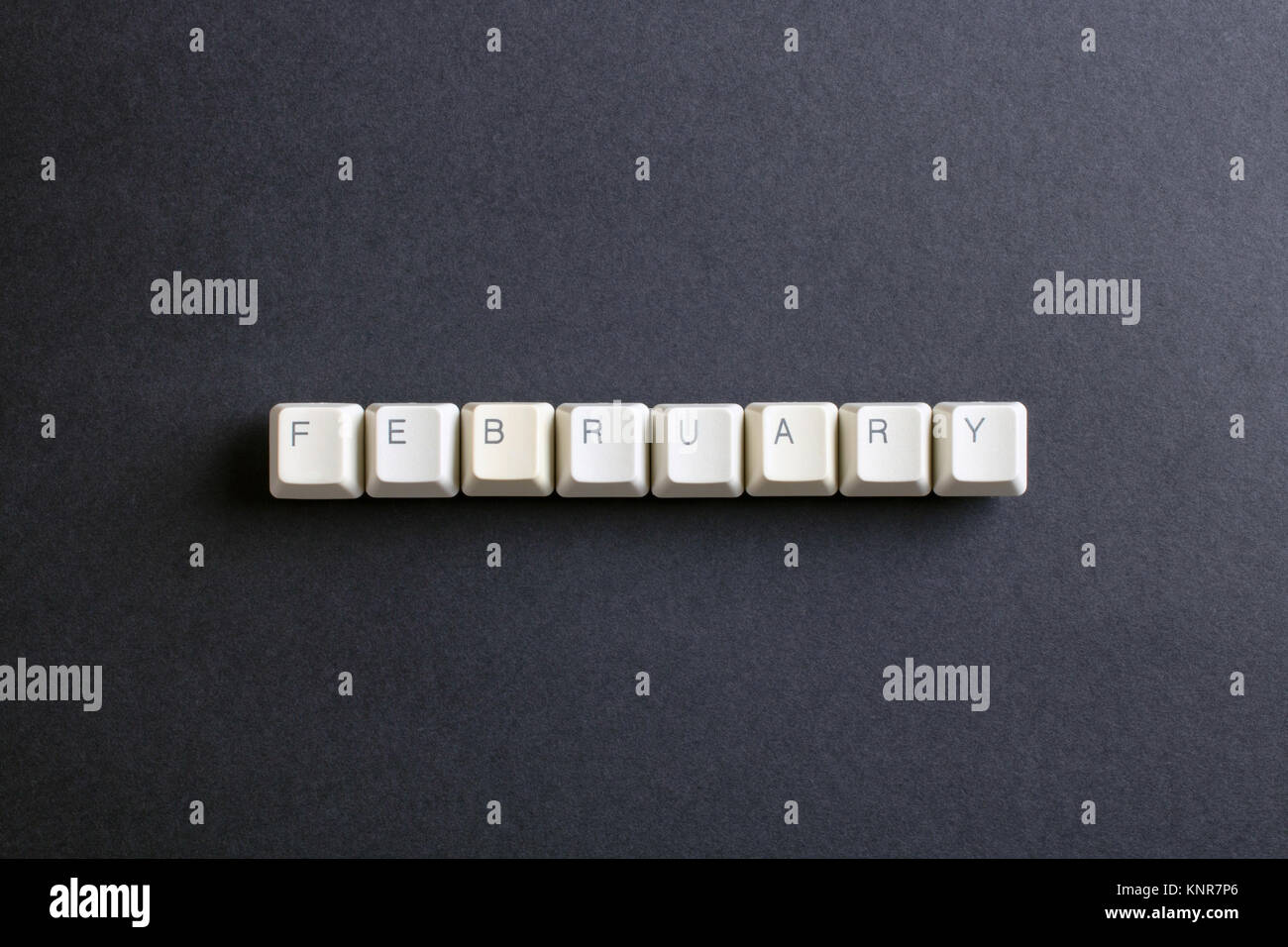 February month word is written with computer keys button. Flat lay view ...
