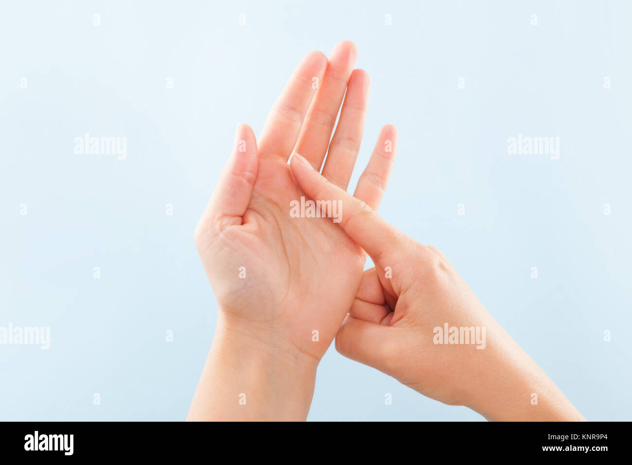 Fingerspelling alphabet. Female hands isolated on blue background ...