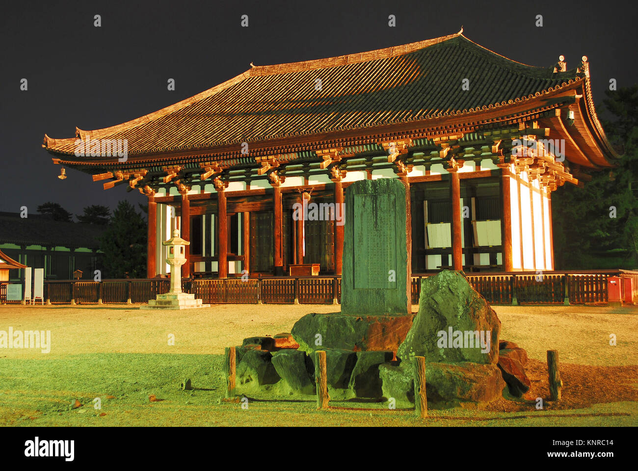 Majestic, night view of ancient temple with stone slab marking at the ...