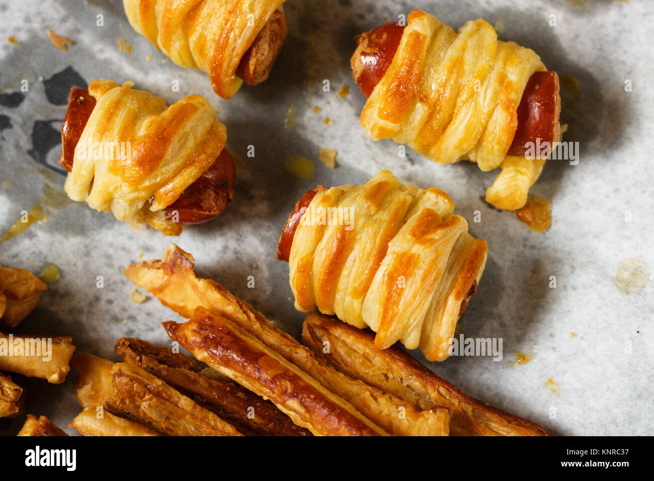 Homemade savoury partyfood - cheese sticks and phyllo rolls with ...