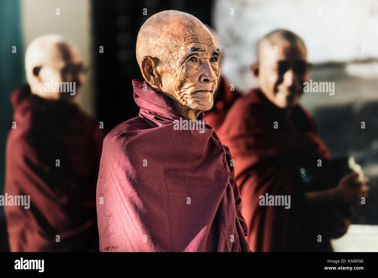 monks waiting for food in Myin Ka Bar, Bagan, Myanmar, Asia Stock Photo ...