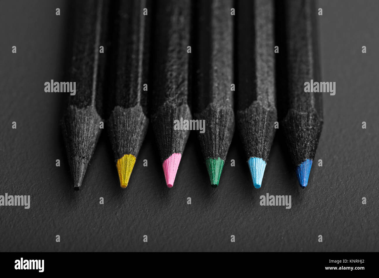 black, colored pencils, on black background Stock Photo - Alamy