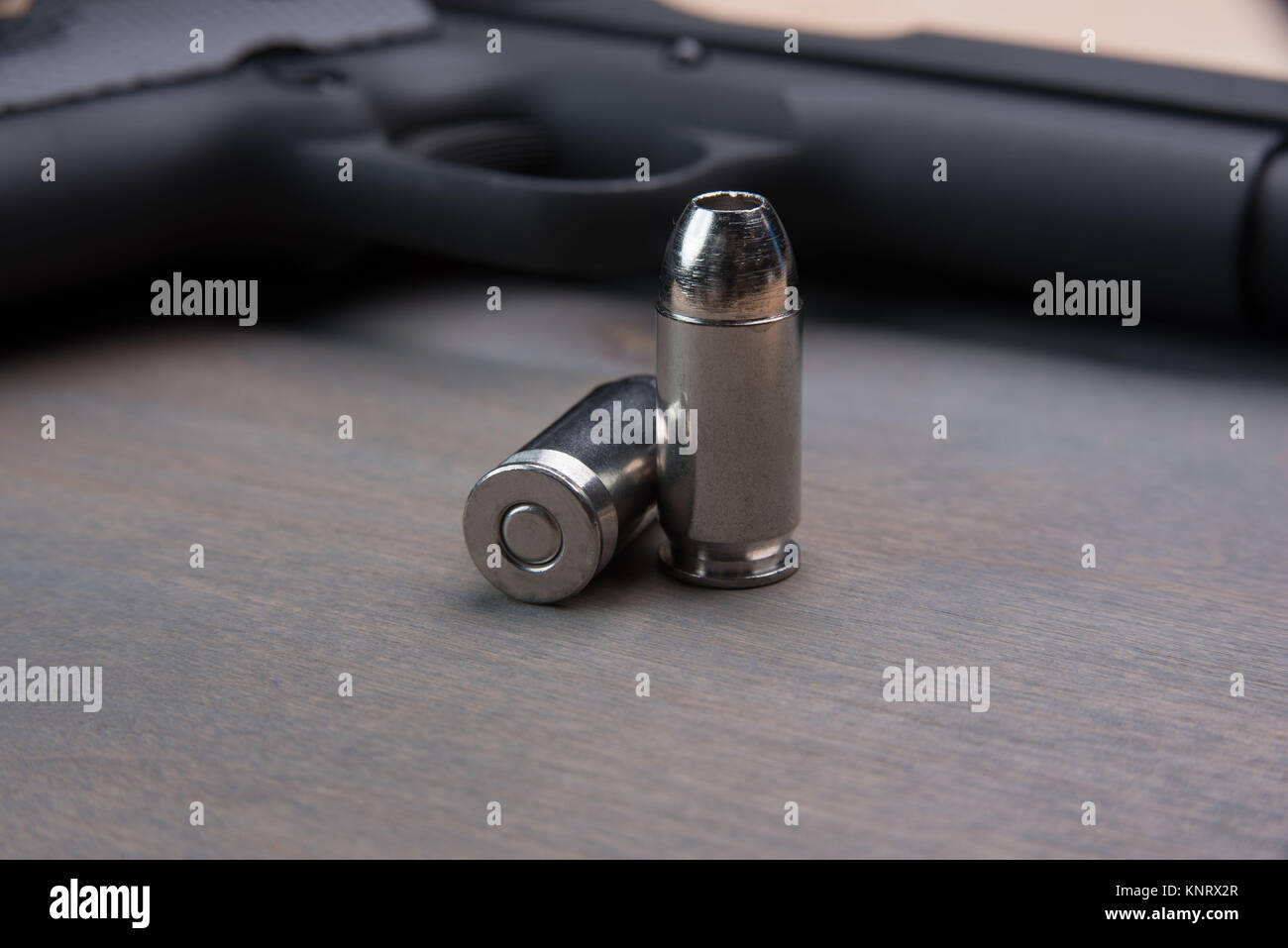 Handgun and Hallow-point bullets Stock Photo - Alamy
