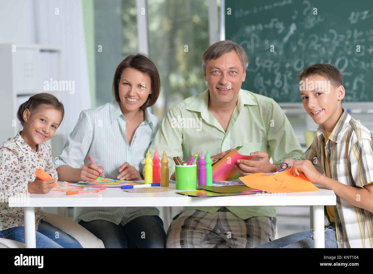 Happy family drawing Stock Photo - Alamy