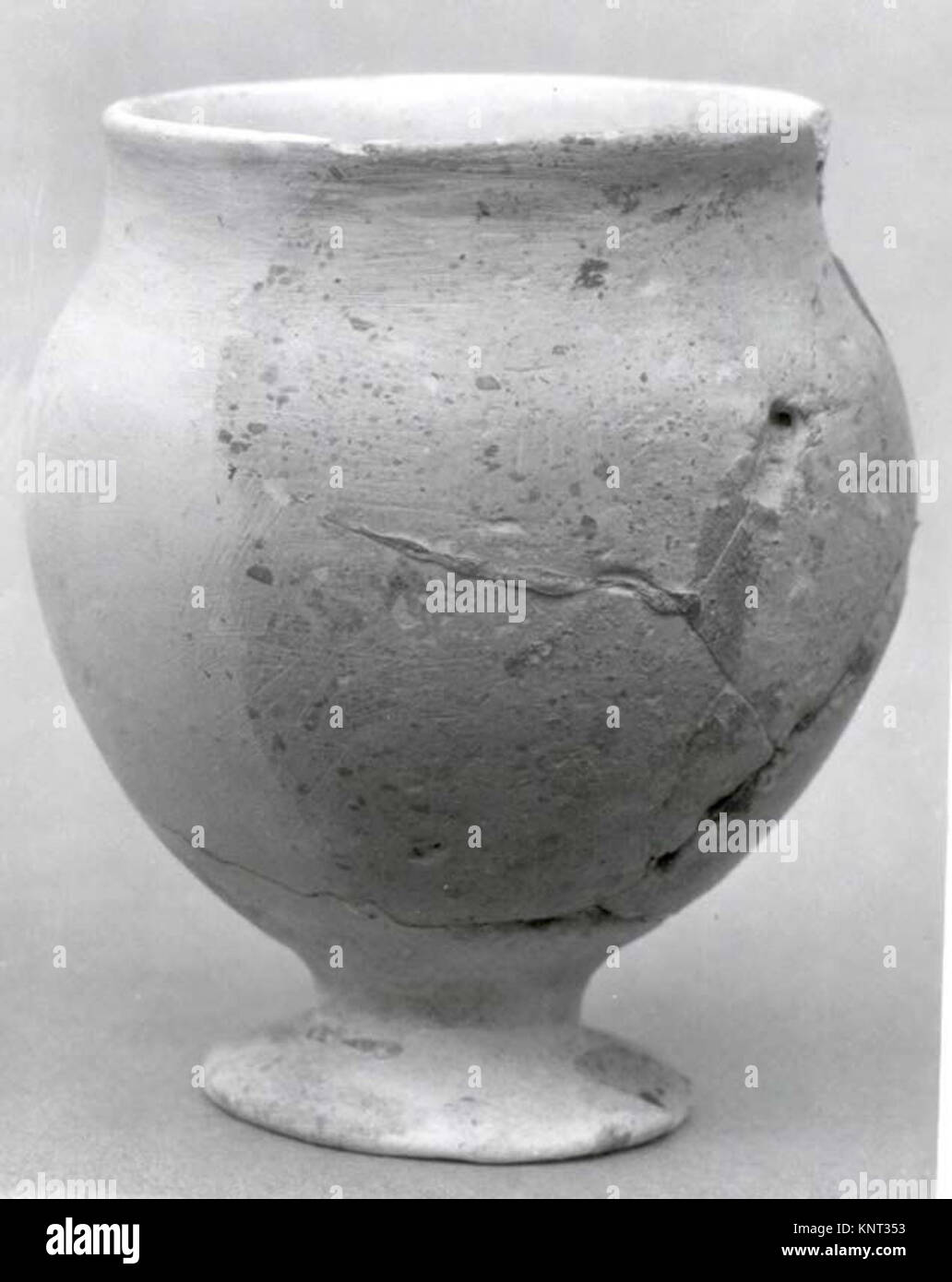 A footed goblet, a drinking vessel with a stemmed base, typically made ...