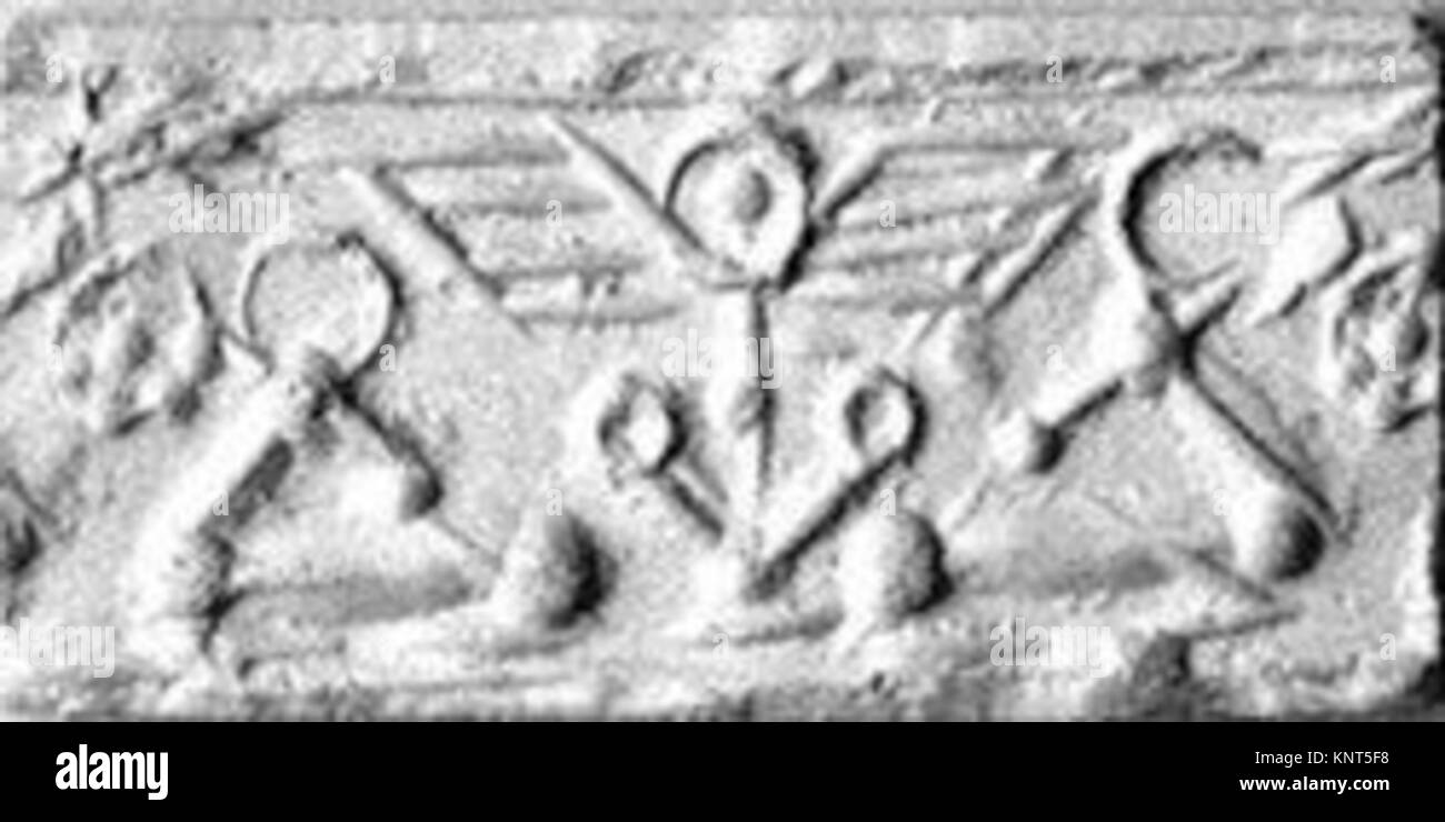 This cylinder seal displays engraved figures and symbols used in ...