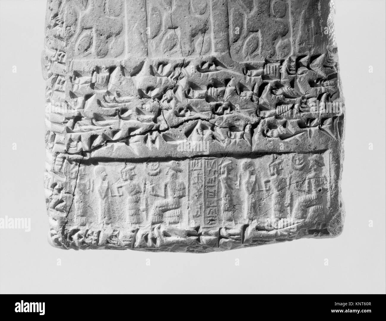 Cuneiform tablet case impressed with four cylinder seals in Assyrian ...