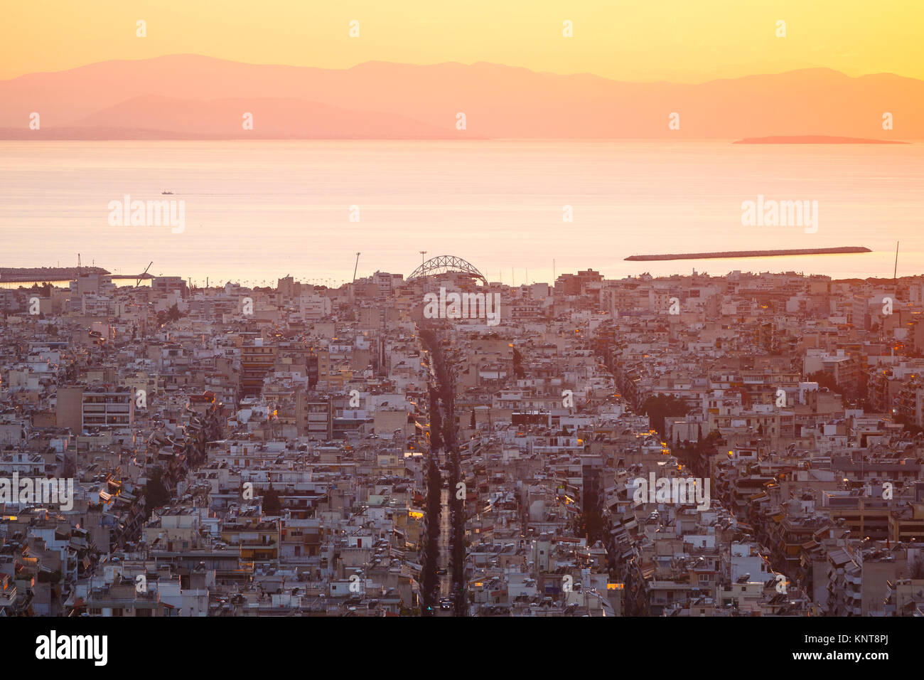 View of Athens from Filopappou hill towards Aegina island and Peloponnese at sunset, Greece ...
