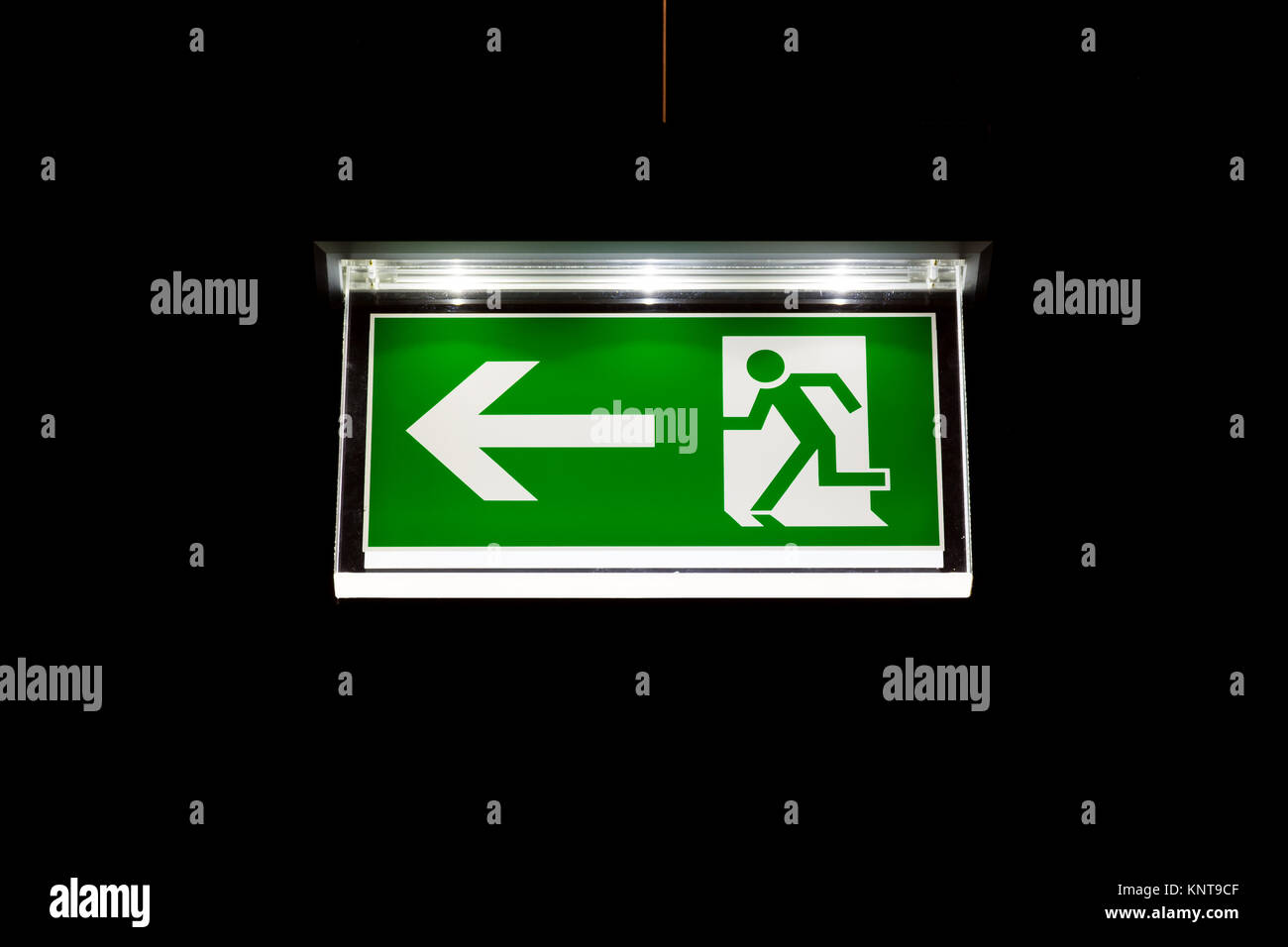Modern Exit Sign Glass White Illuminated on Black Background Interior ...