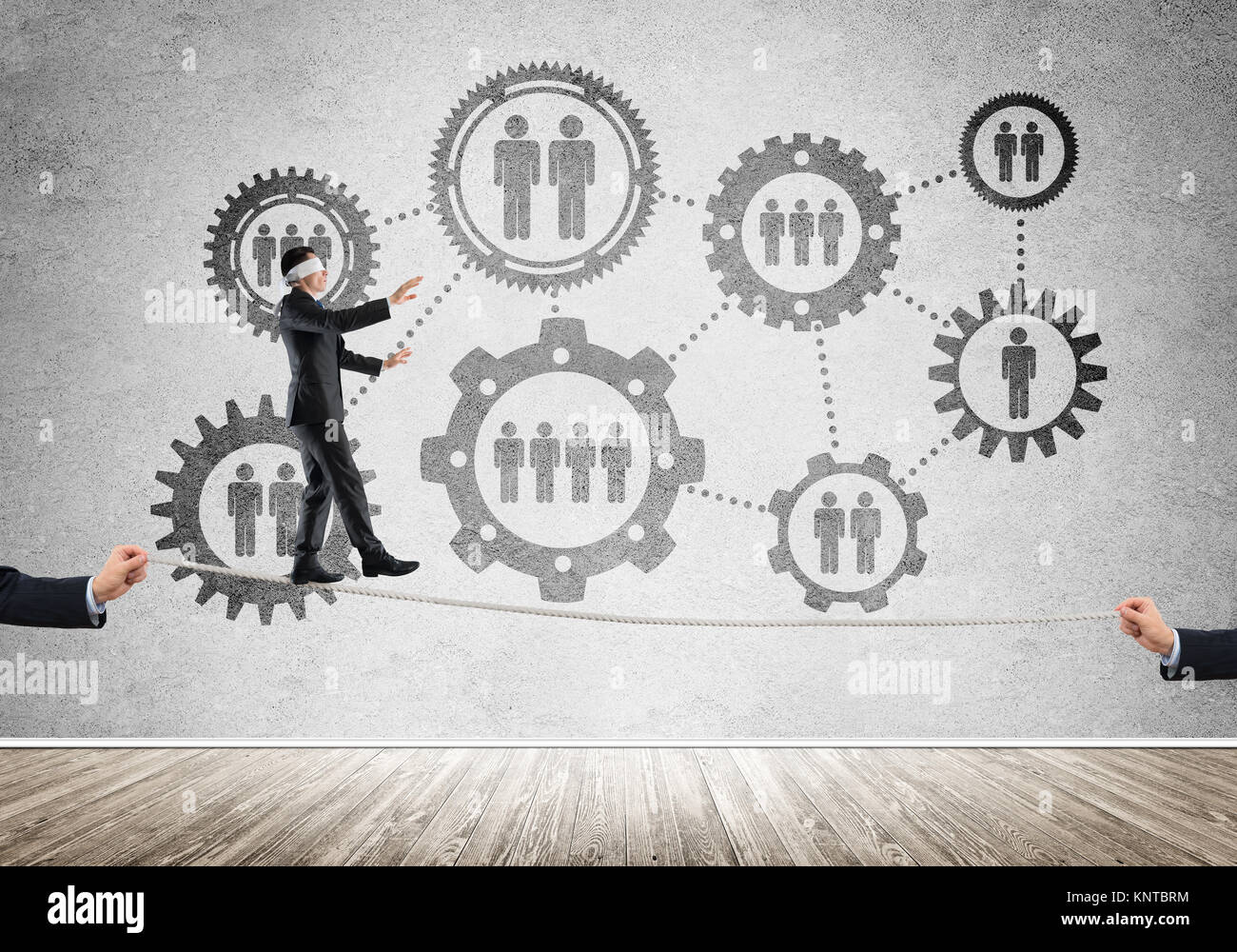 Business concept of risk support and assistance with man balancing on ...