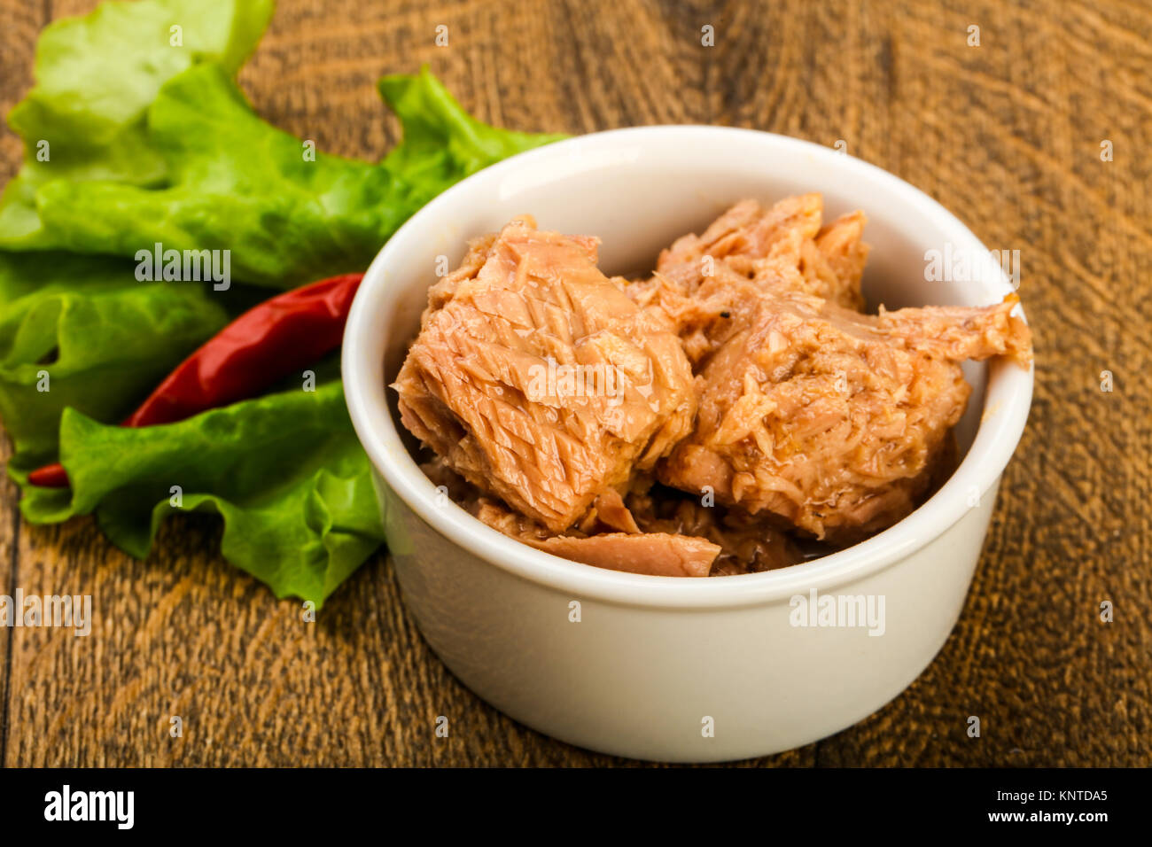 Canned tuna fish in the bowl ready for cooking Stock Photo - Alamy