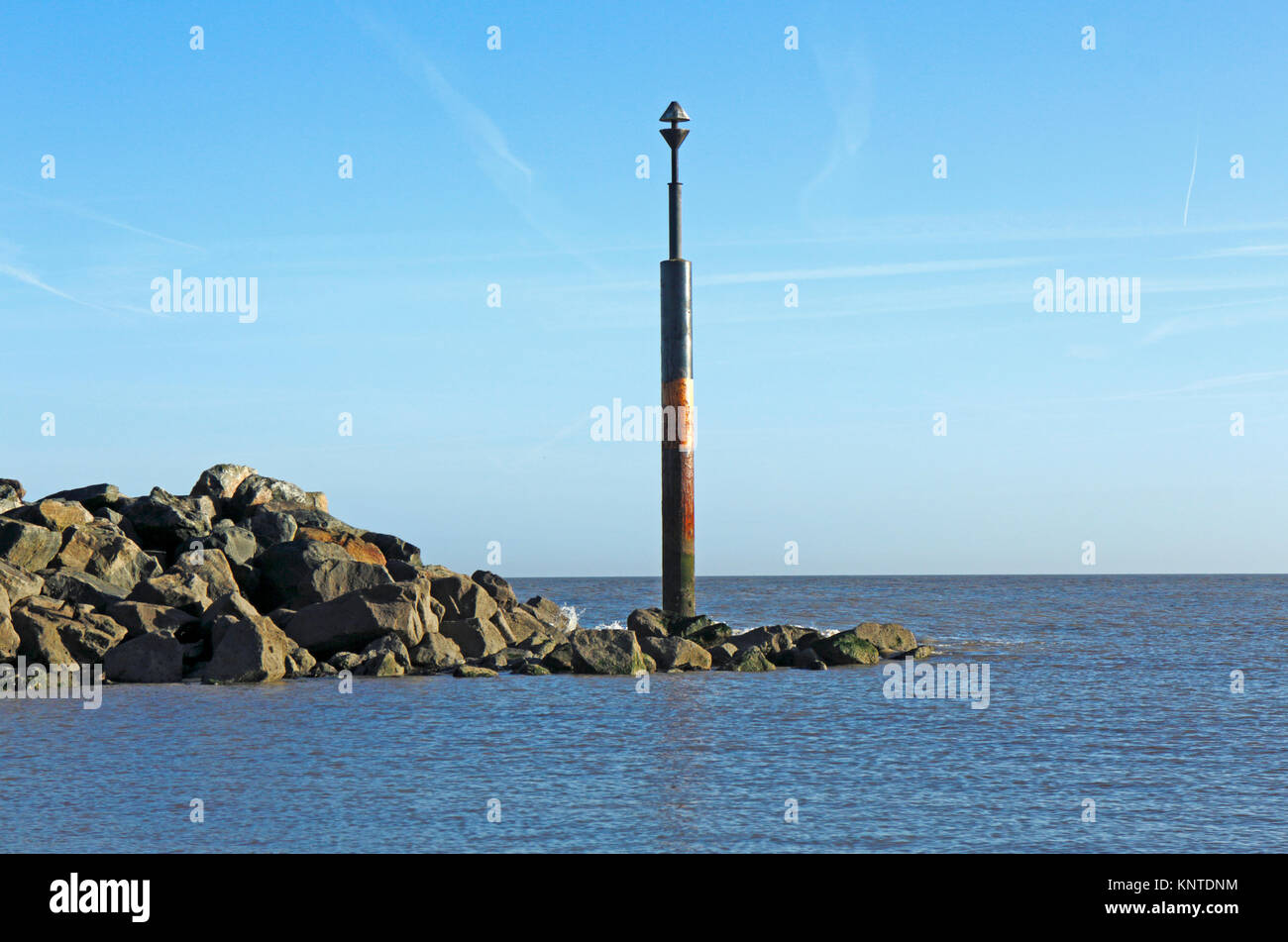 A view of an artificial reef with marker post on the Norfolk coast at ...