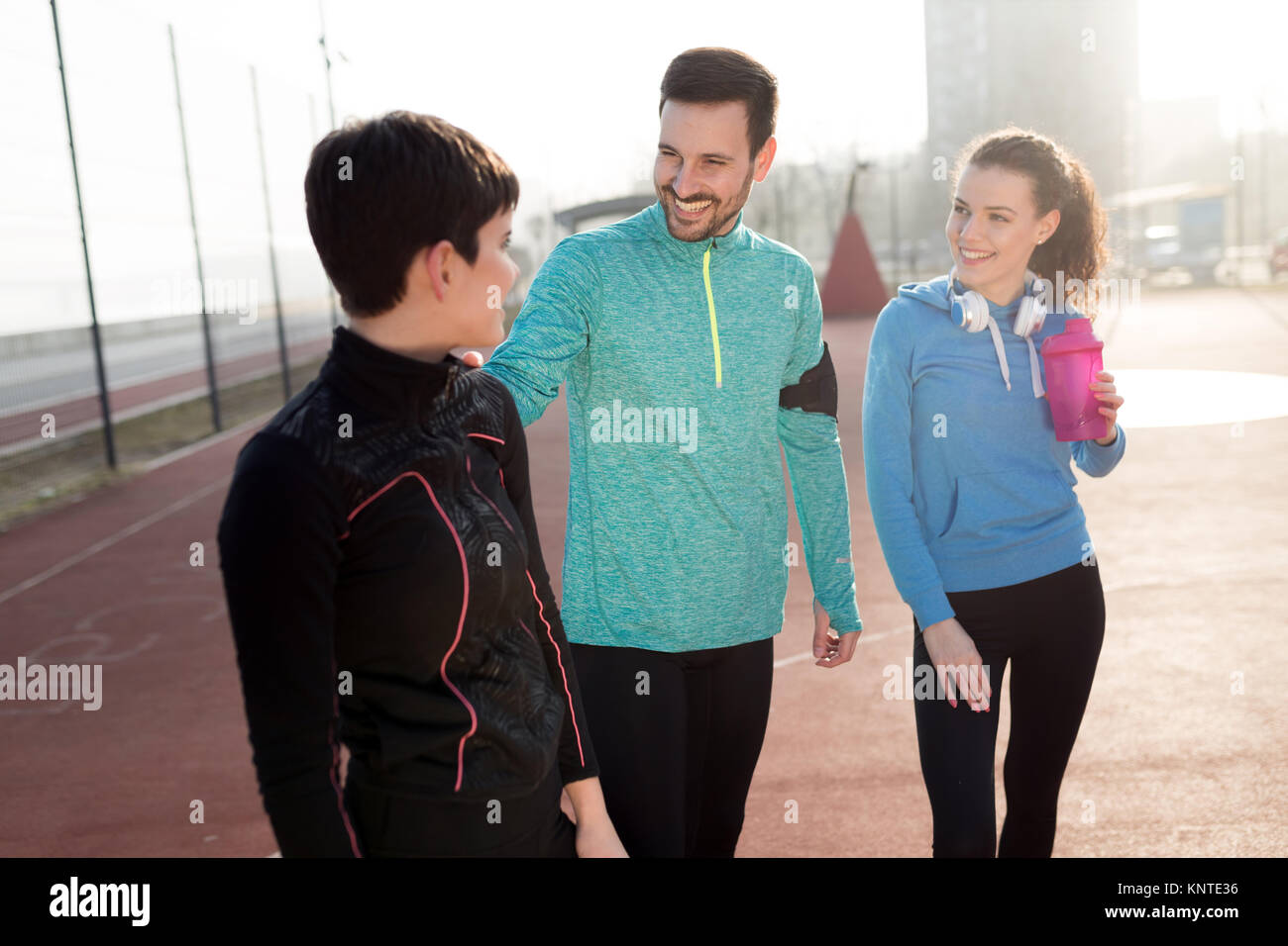 Friends fitness training together outdoors living active healthy Stock ...