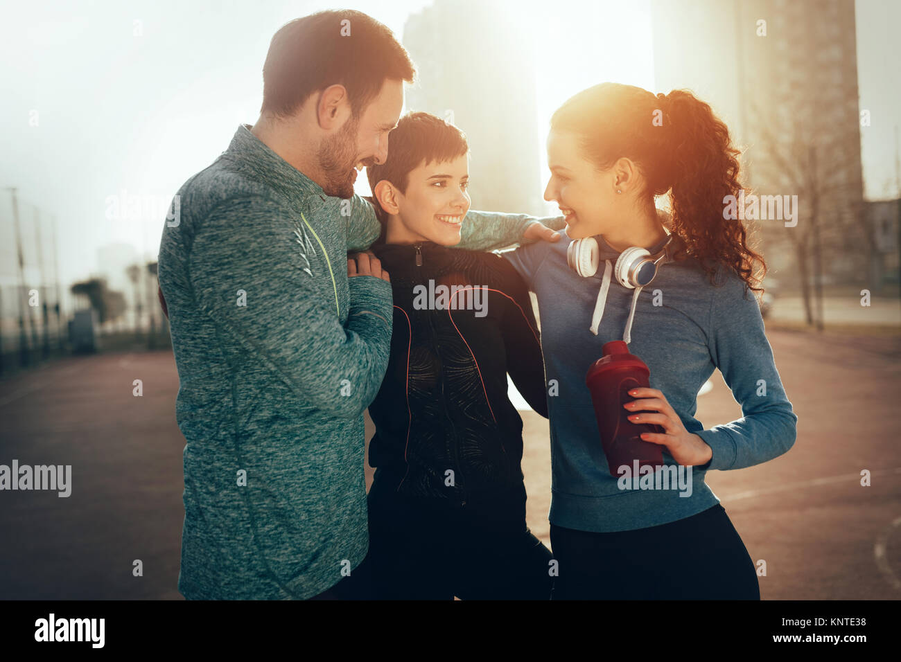Friends fitness training together outdoors living active healthy Stock ...