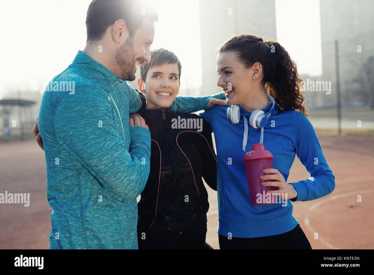 Friends fitness training together outdoors living active healthy Stock ...