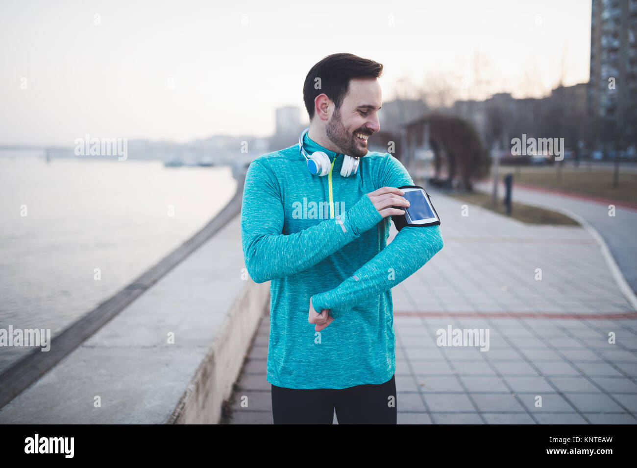 Handsome healthy sportsman exercising Stock Photo - Alamy