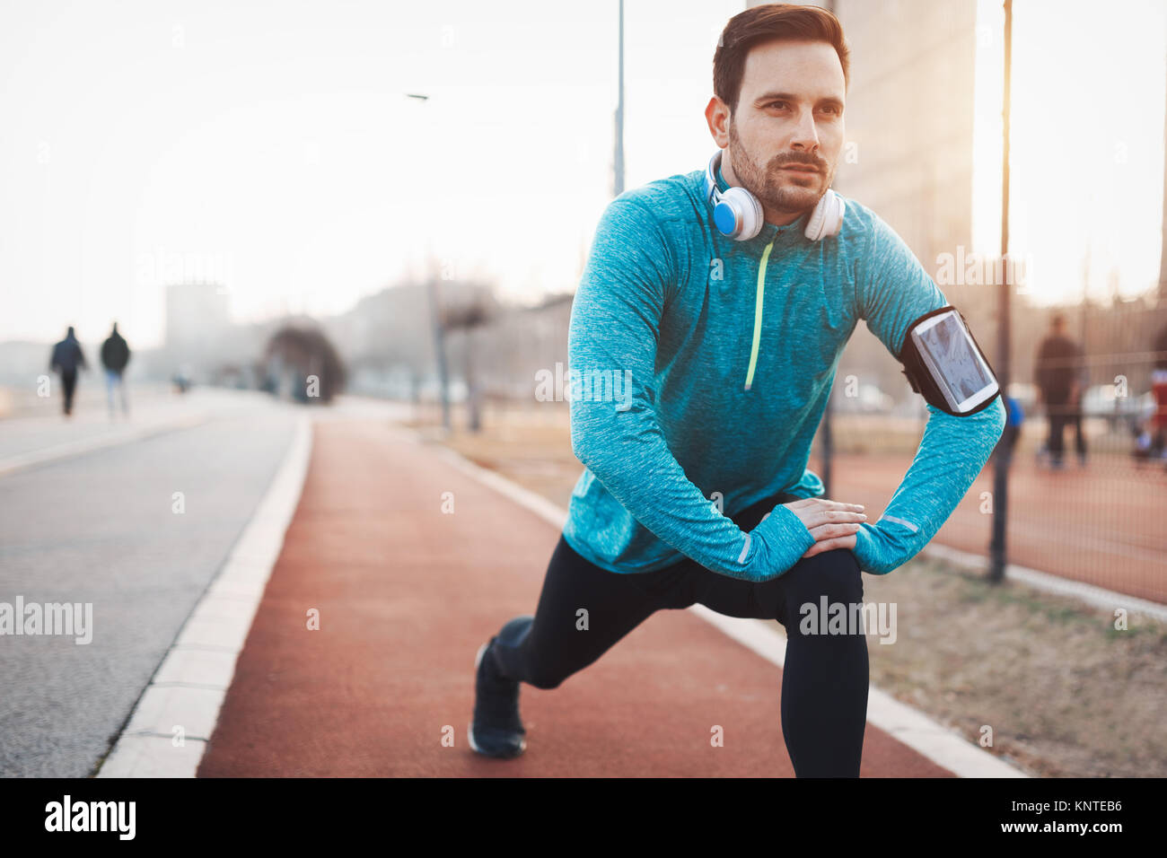 Handsome healthy sportsman exercising Stock Photo - Alamy