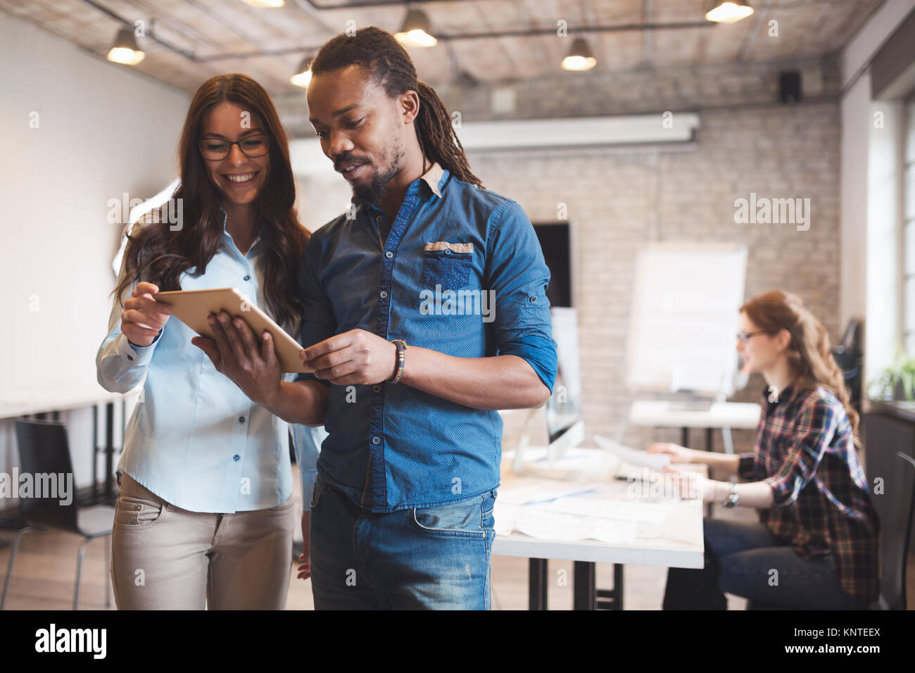 Company employees working in software development and designer office ...