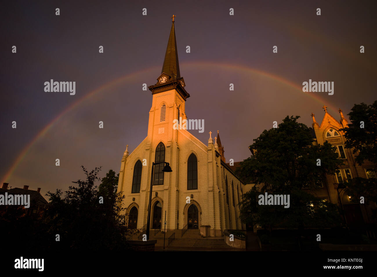 Rainbow over church hi-res stock photography and images - Alamy