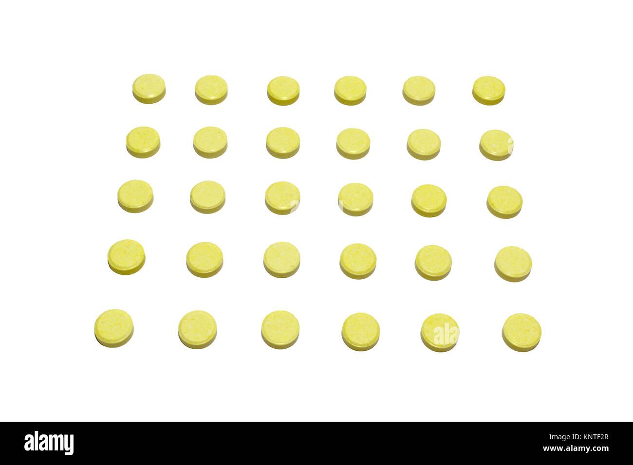 tablets yellow colored with no stripes for division, arranged in ...