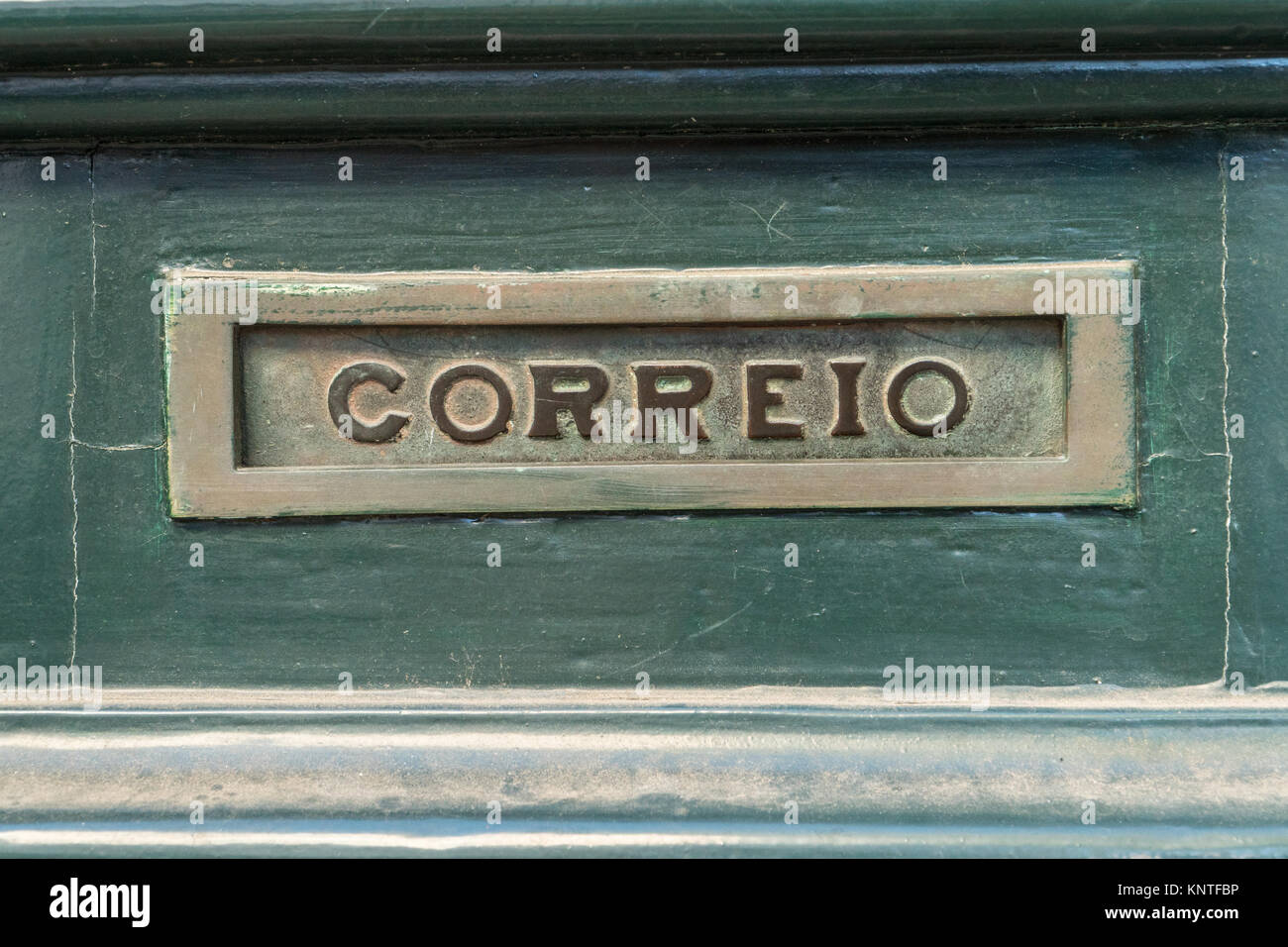 Old rusty mailbox with the word "mail" - in Portugese "correio Stock ...