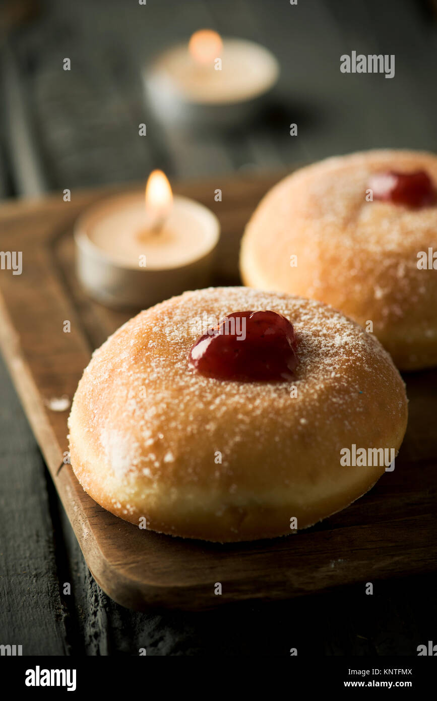 closeup of some sufganiyot, Jewish donuts filled with strawberry jelly ...