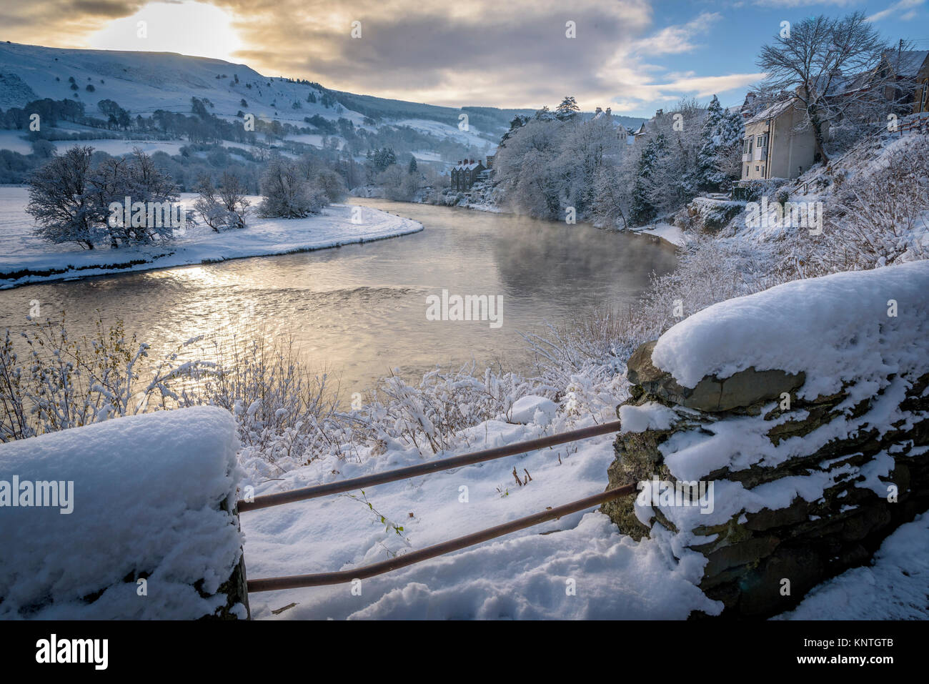 Snowy scene North Wales River Dee by the old stone bridge at Carrog ...