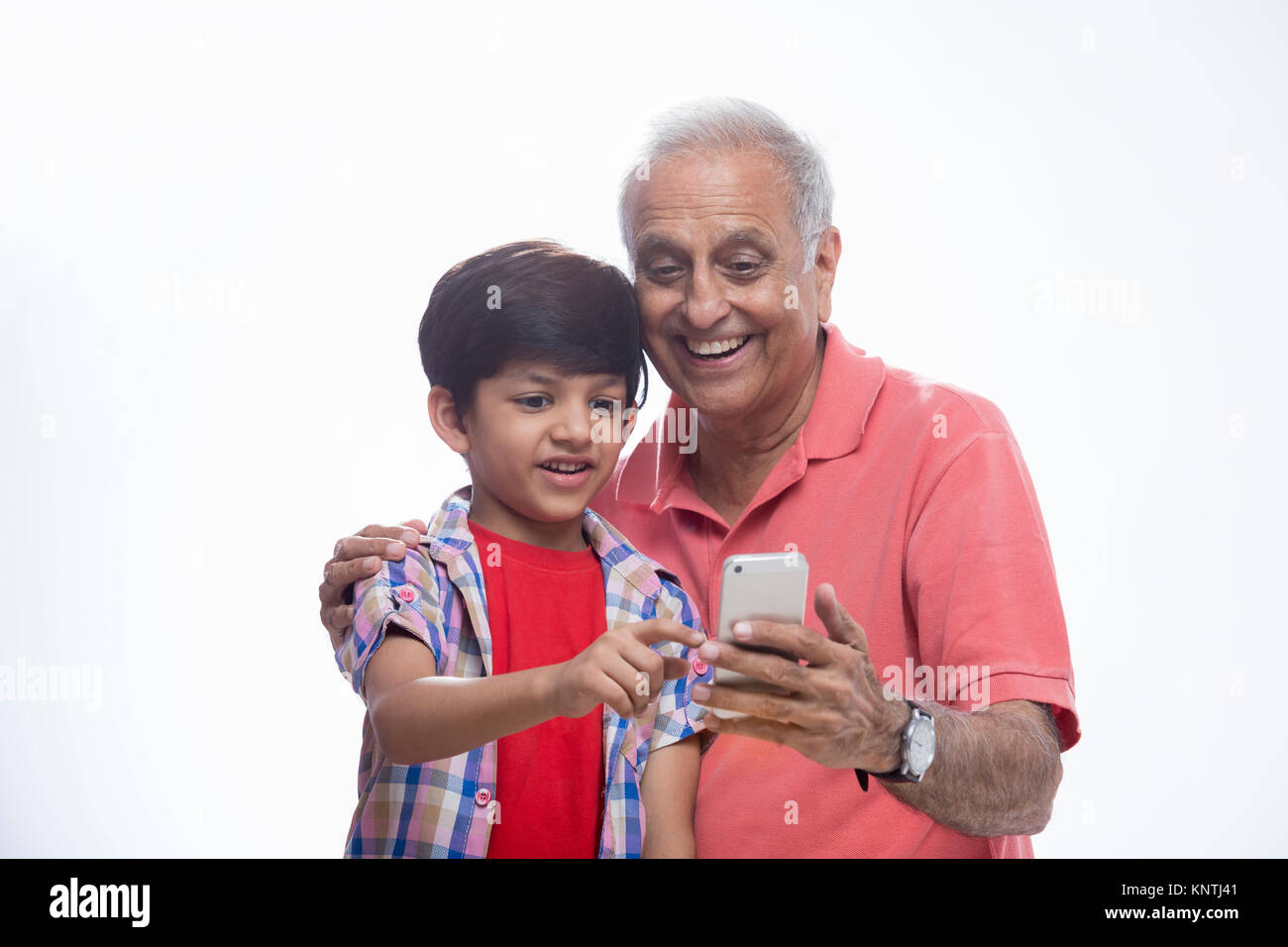 Happy boy using smart hi-res stock photography and images - Alamy