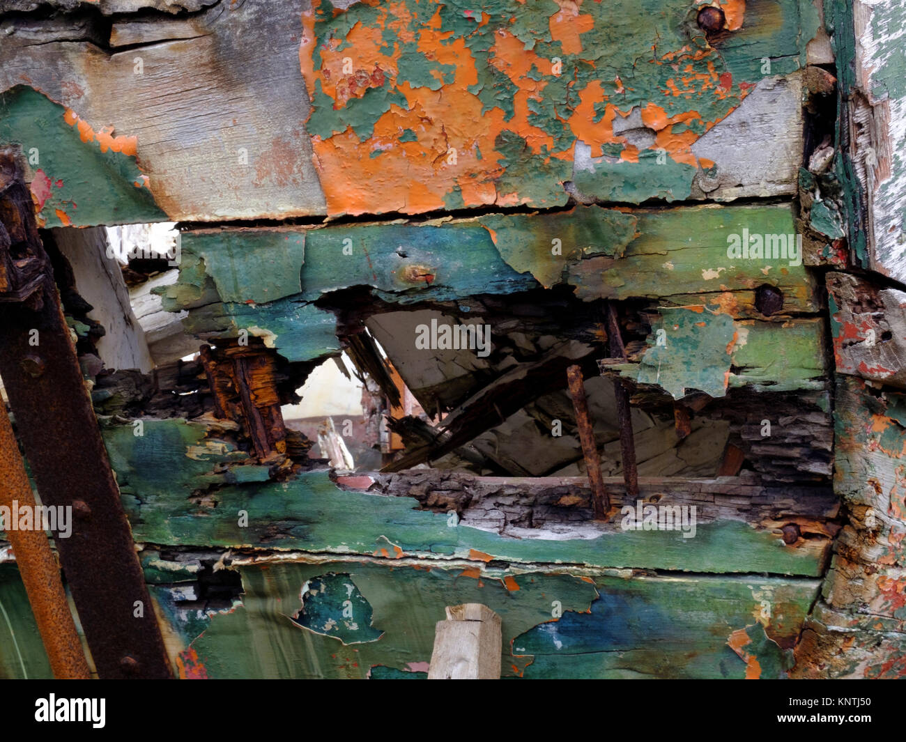 A run down and forgotten old wooden boat in a state of dereliction ...