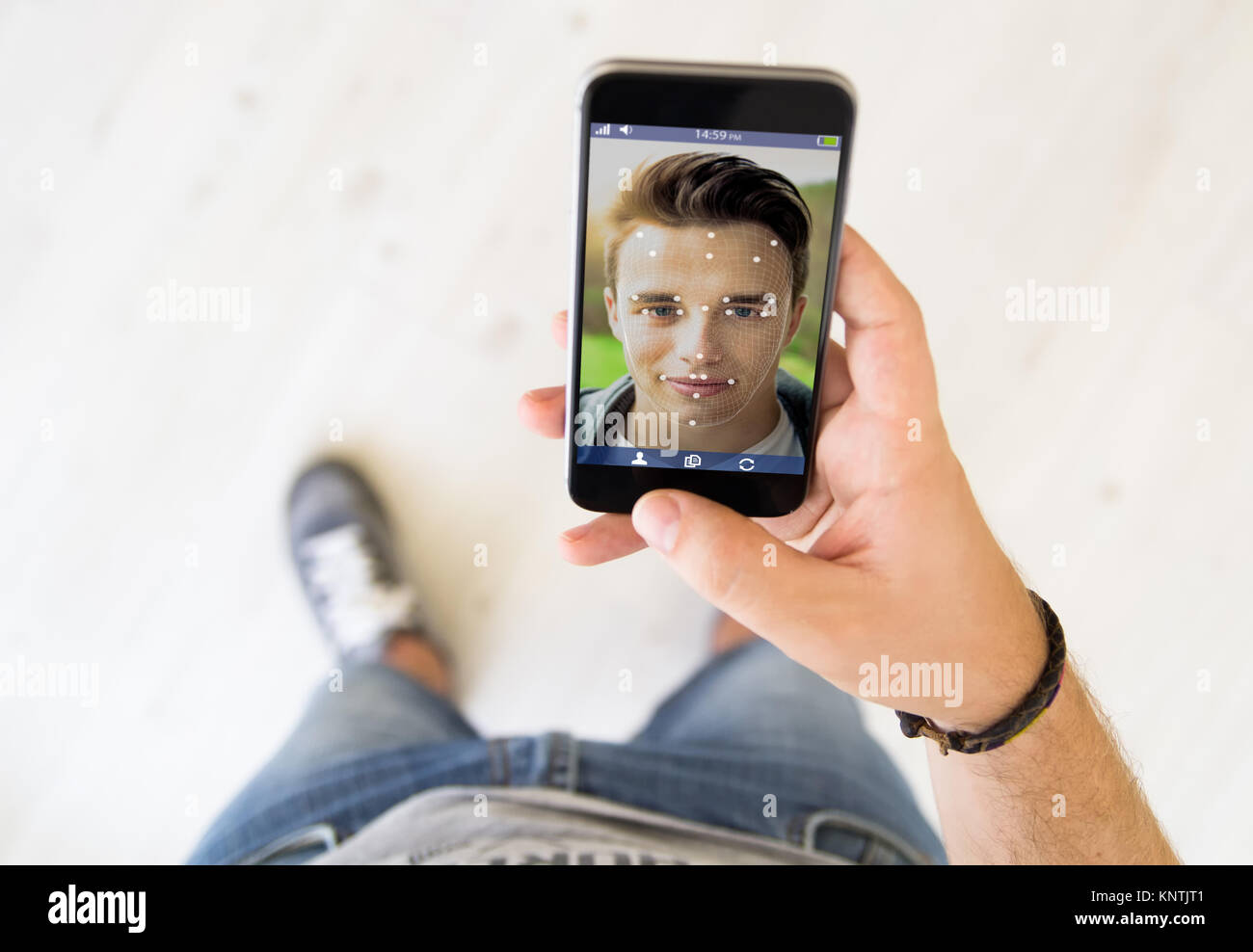 close up of male hand using face id technology on smart phone Stock ...
