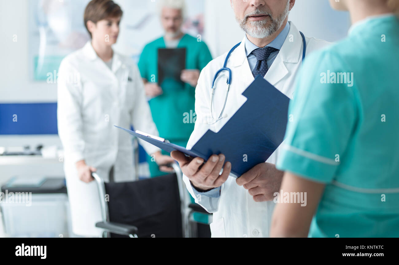 Professional doctor and medical staff working at the hospital, he is ...