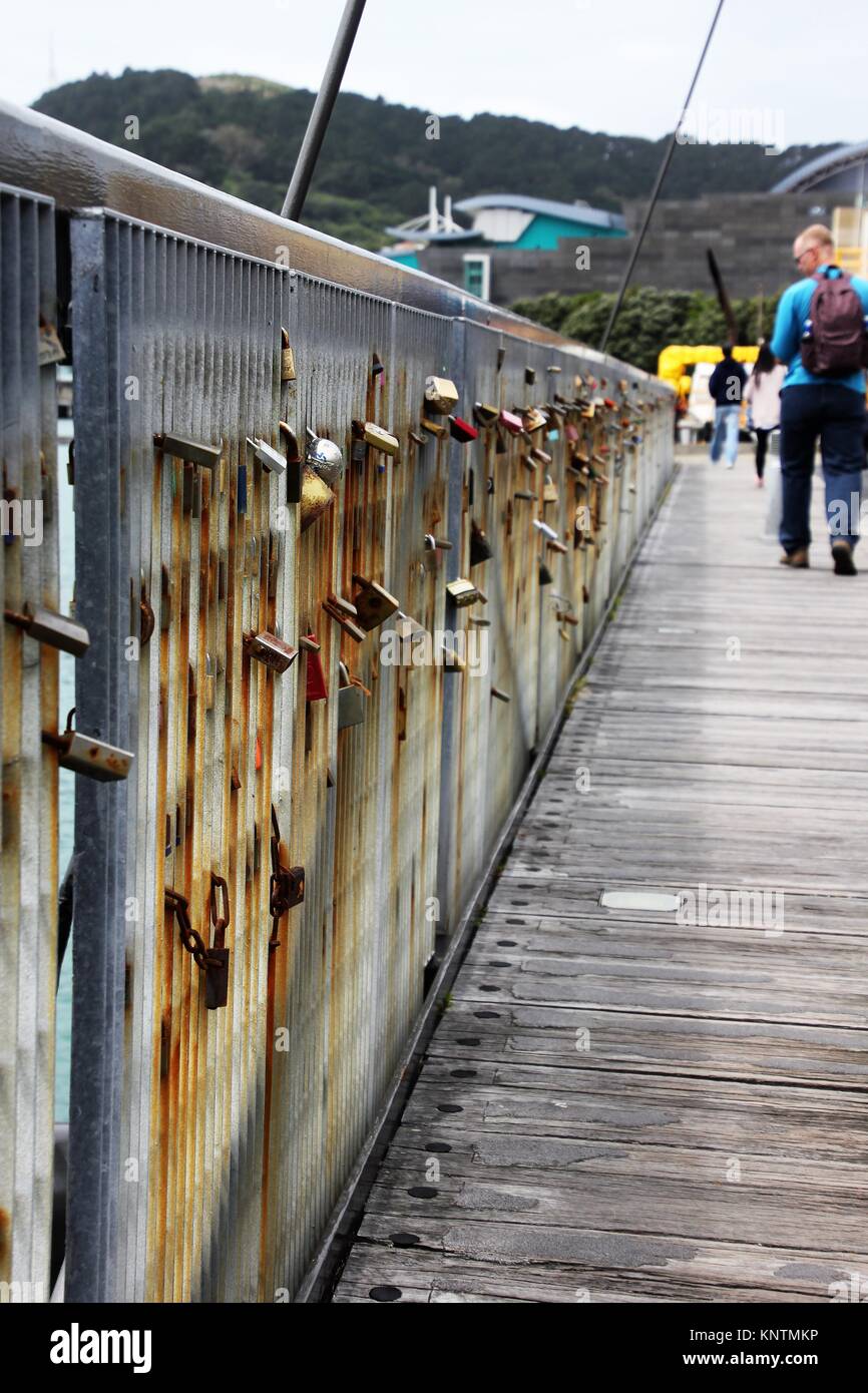 Locks on fence hi-res stock photography and images - Alamy