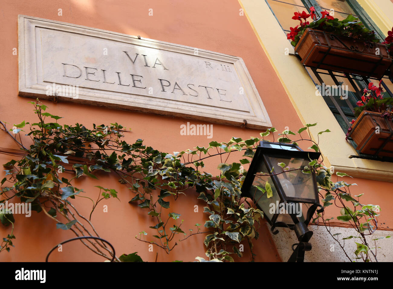 Via Delle Paste - street name sign in Rome, Italy with light pole Stock ...