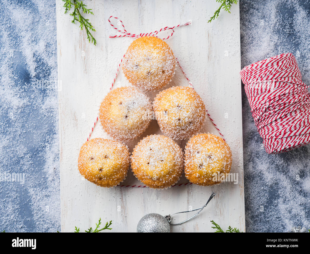 Christmas muffins tree with icing sugar. Holiday baking concept Stock ...