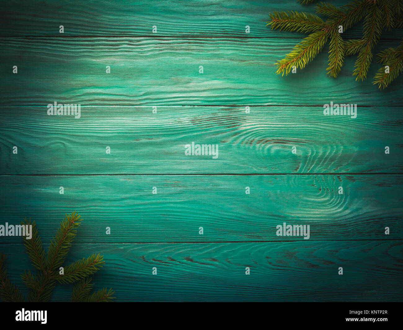 Christmas background with branches frame on green wooden board Stock ...