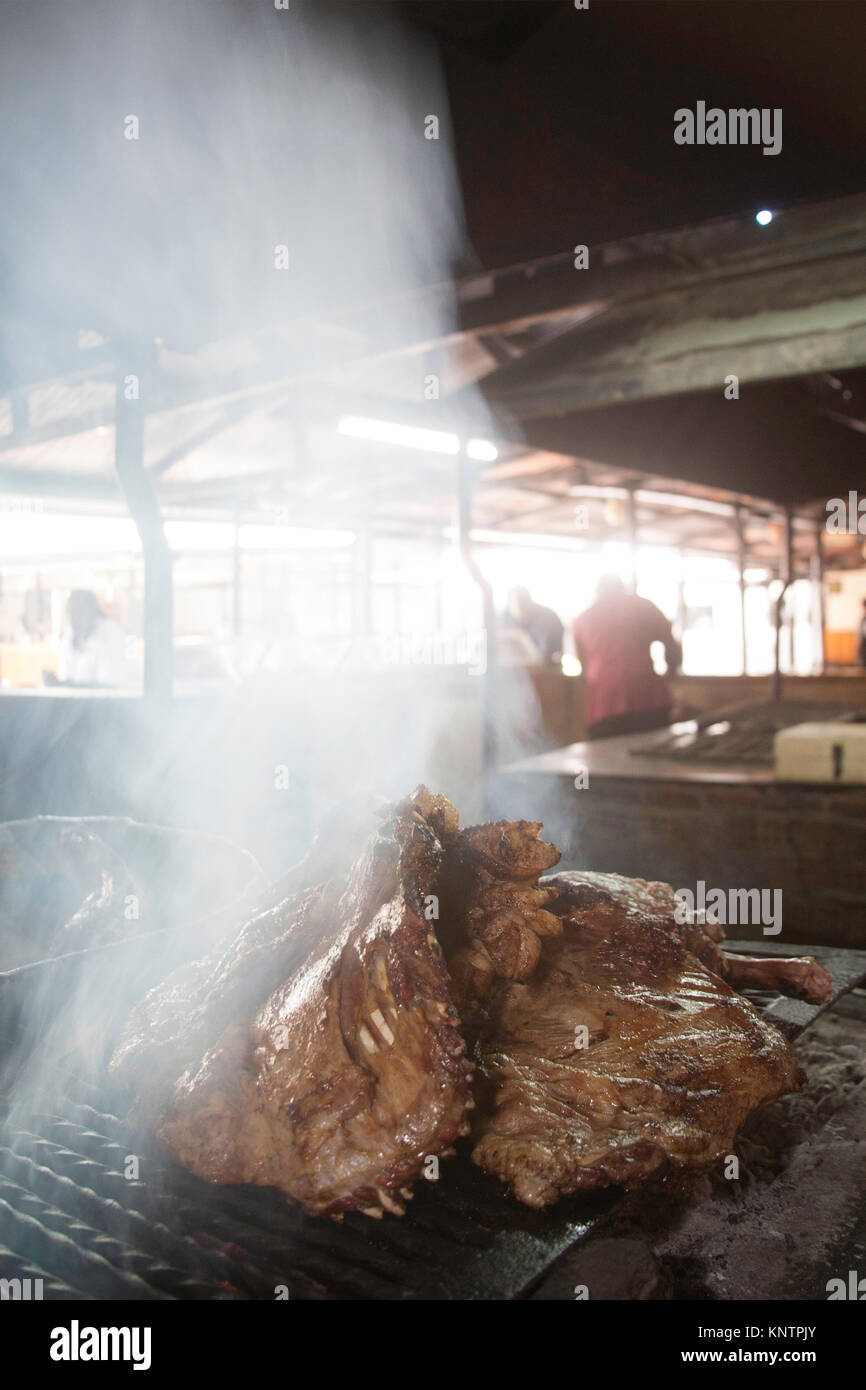 Nyama Choma or traditional street food of grilled meat bbq served in a ...