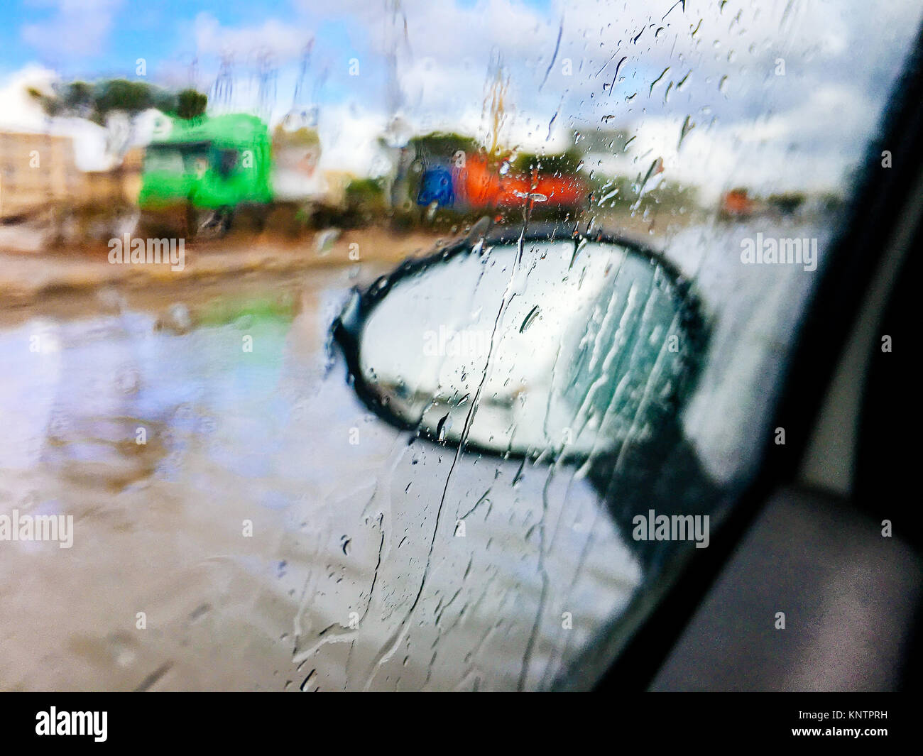 Wing Mirror In Rain Taken Through Car Window Stock Photo - Alamy