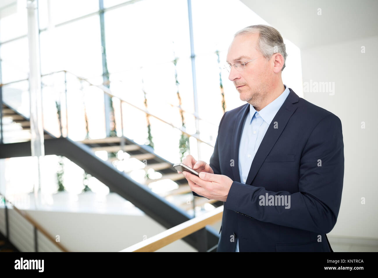 Businessman messaging hi-res stock photography and images - Alamy