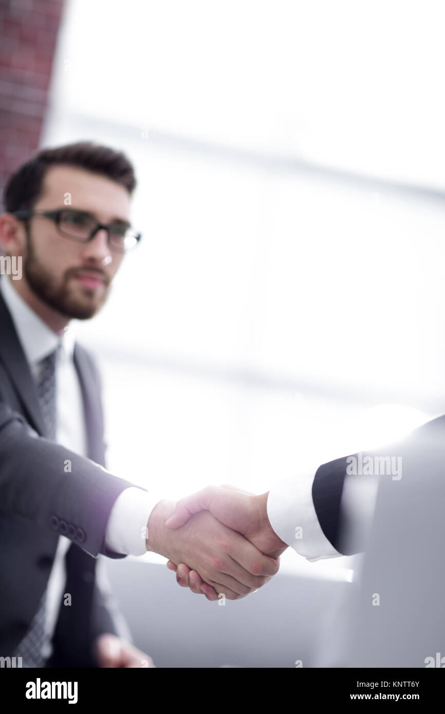 businessman shaking hands in office Stock Photo - Alamy